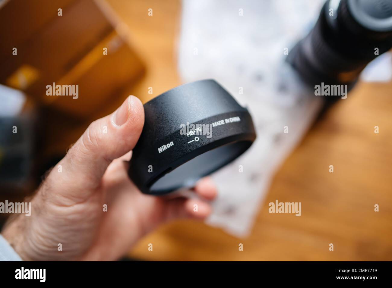 Paris, France - Jan 16, 2023: View from above of new Nikon HB-76 lens ...