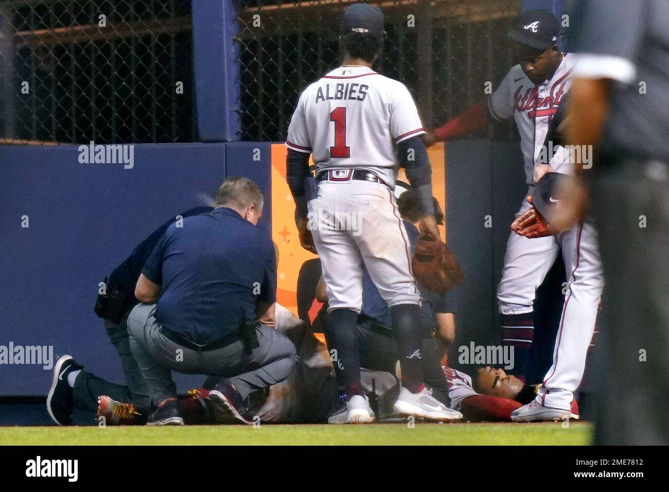 Atlanta Braves right fielder Ronald Acuna Jr., lies on the field after ...