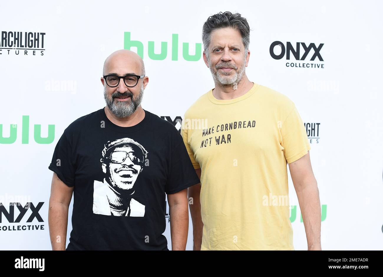 From left, David Dinerstein and Robert Fyvolent arrive at the Los ...