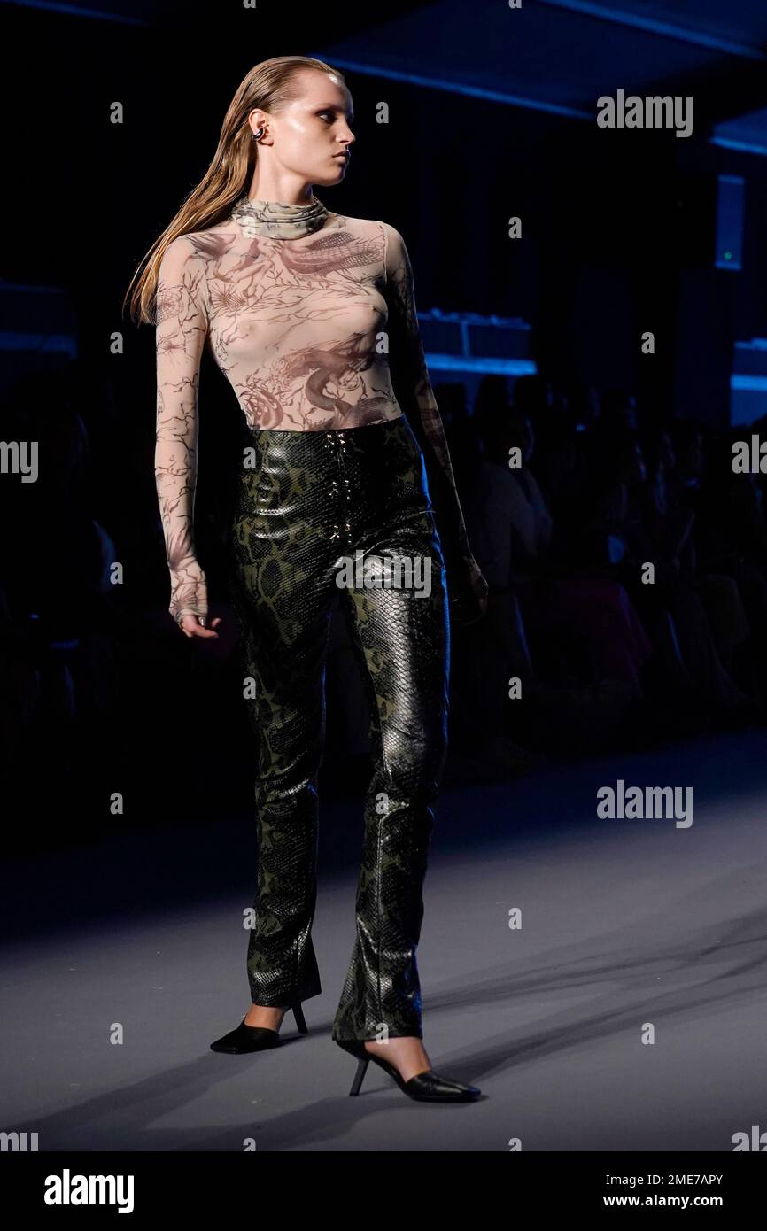 A model walks down the runway in the Simonett fashion show during ...