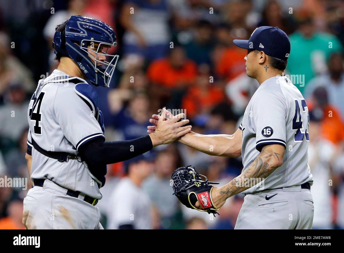 New York Yankees catcher Gary Sanchez, left, and closing pitcher ...