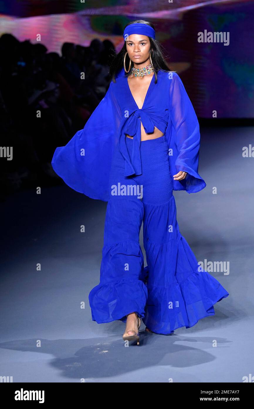 A model walks down the runway in the BFYNE fashion show during Paraiso ...
