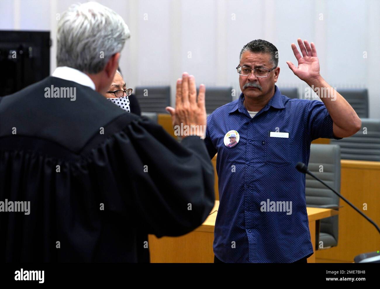 Judge Mark C. Scarsi administers the citizenship oath to U.S. Marine ...
