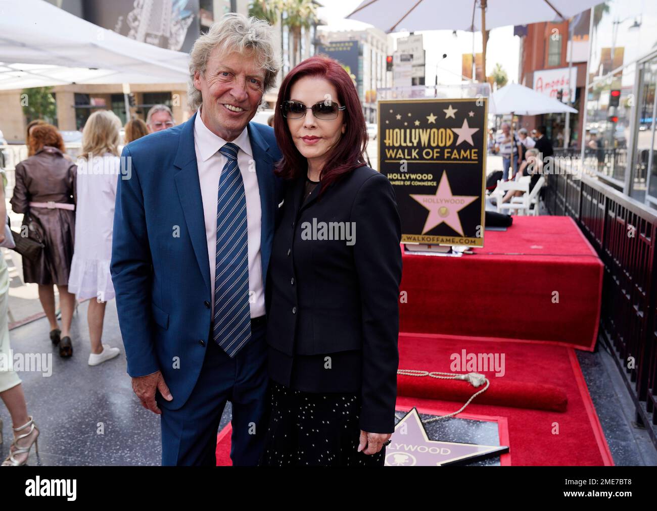 Television producer Nigel Lythgoe poses with Priscilla Presley at a ...