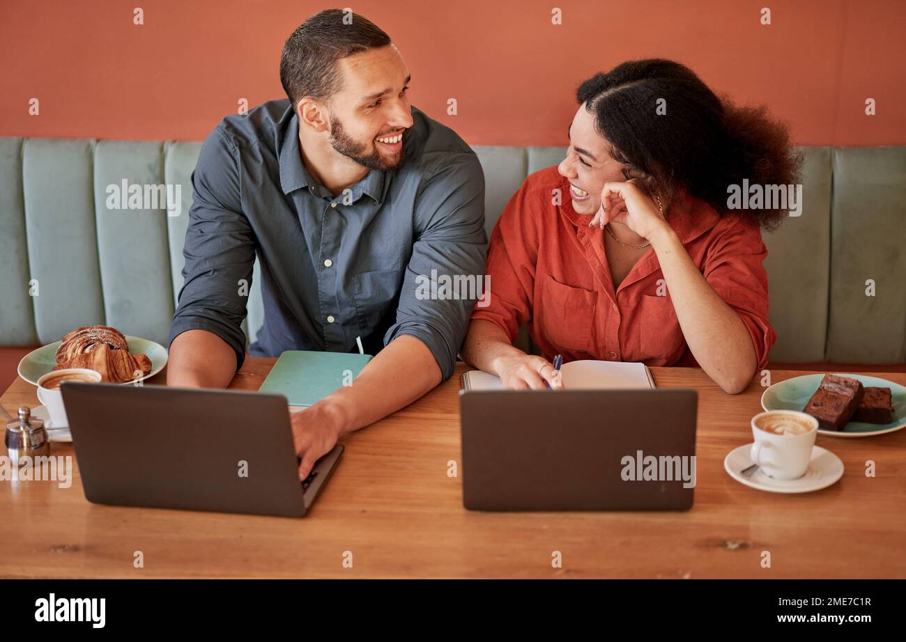 Coffee shop, meeting and small business partnership working on laptops ...