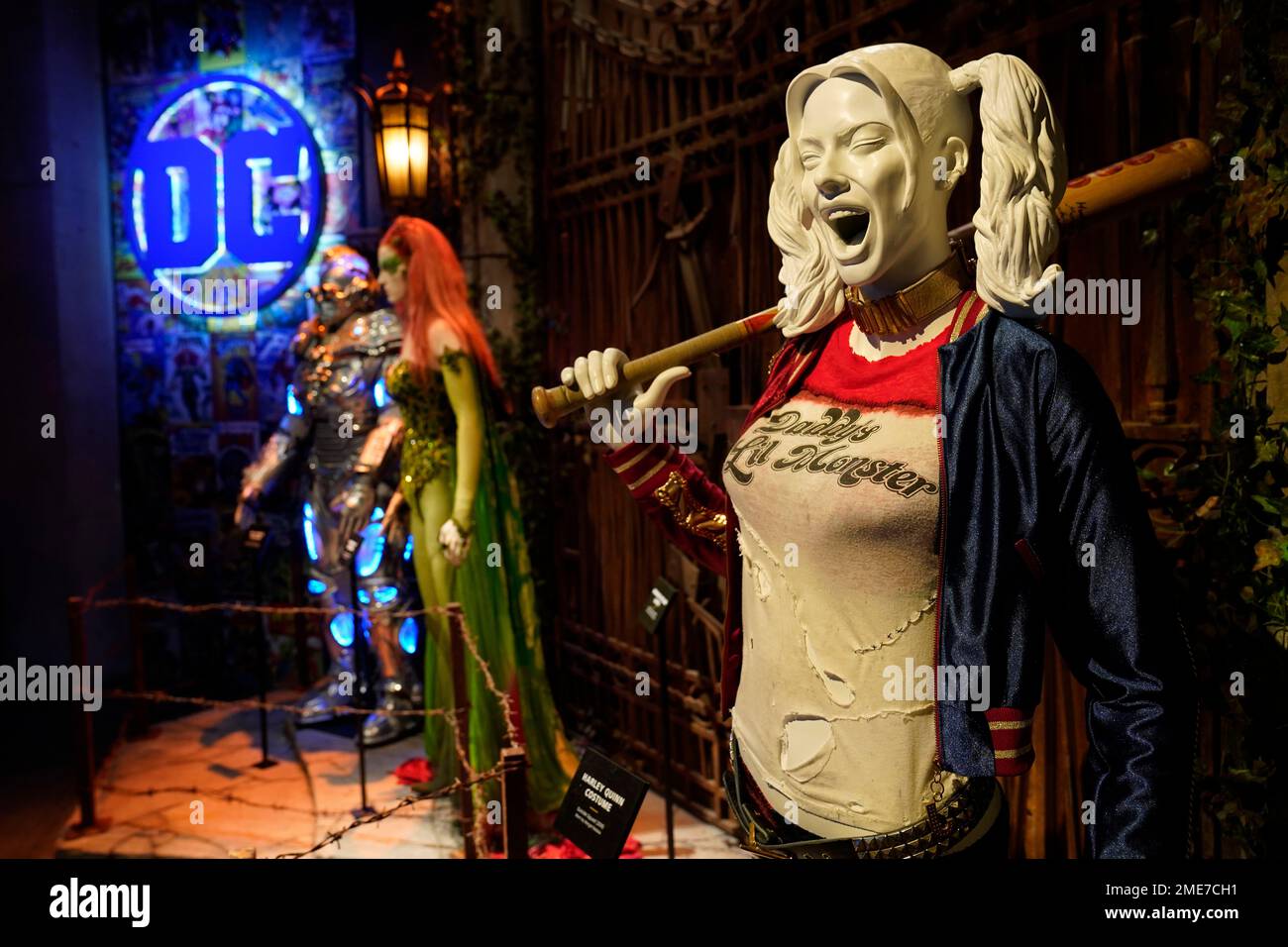 A Harley Quinn costume is displayed at the "Action and Magic Made Here ...