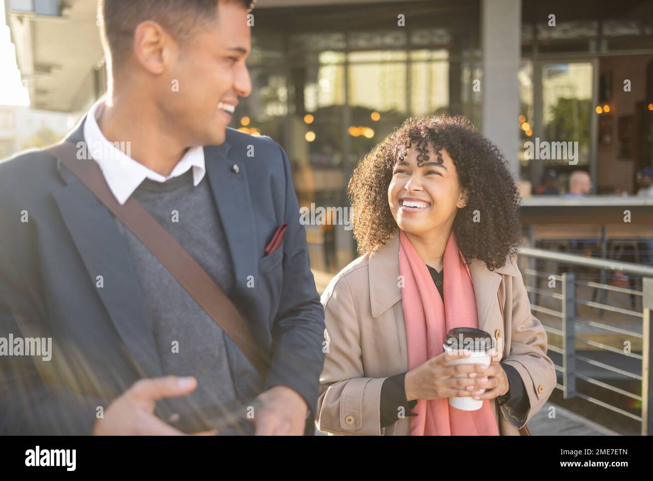 Coffee break, laugh or talking business people walking, commute or ...