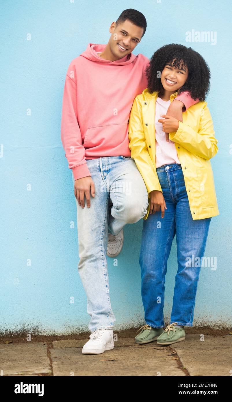 Couple of friends, bonding or hug portrait on isolated blue background ...