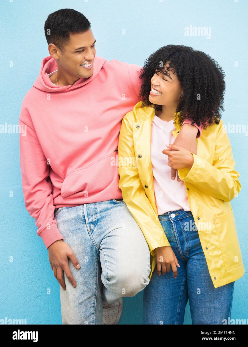 Couple of friends, bonding and hug on isolated blue background in ...