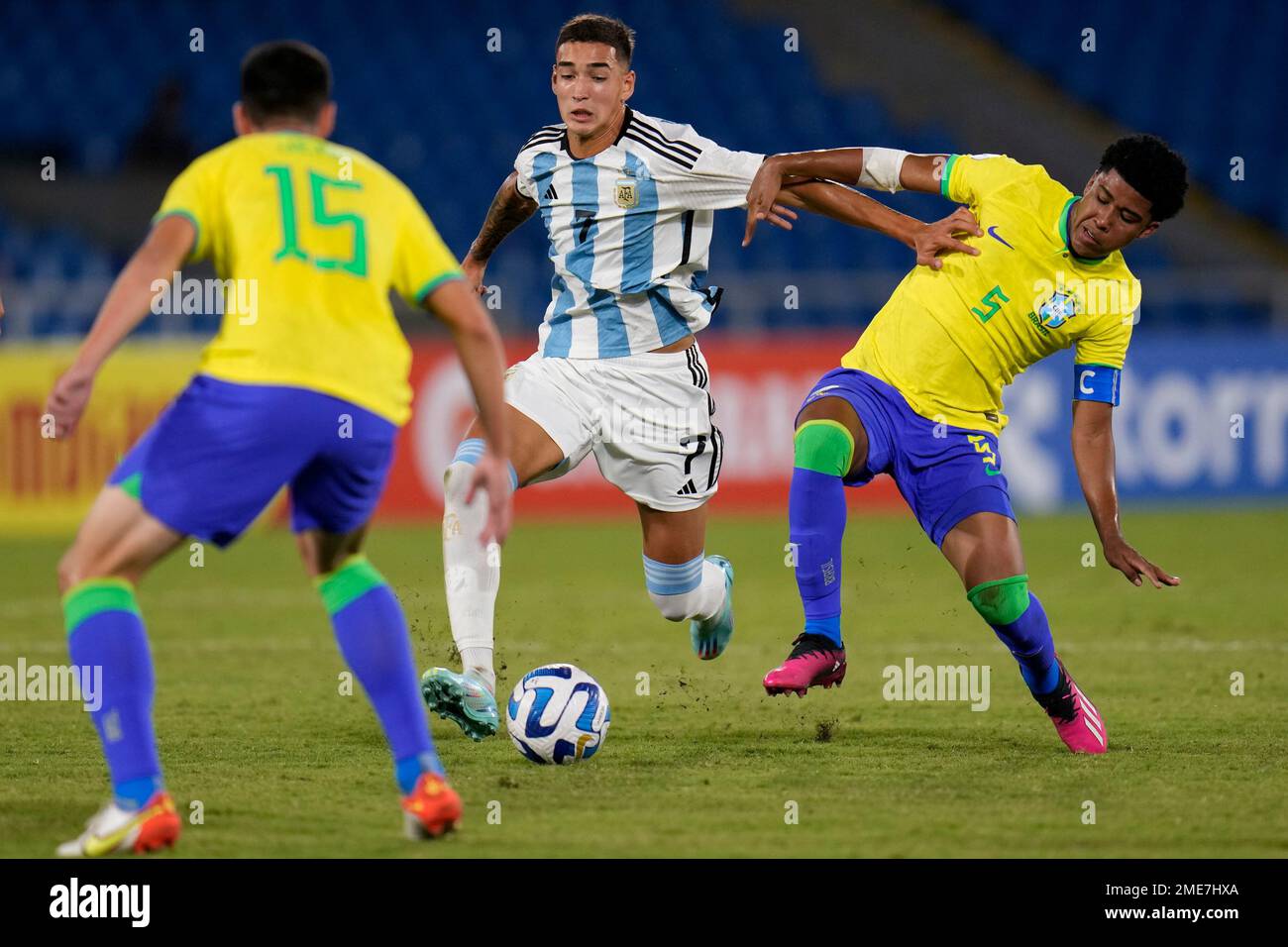 Brazil's Andrey Dos Santos, right, battles for the ball with Argentina ...