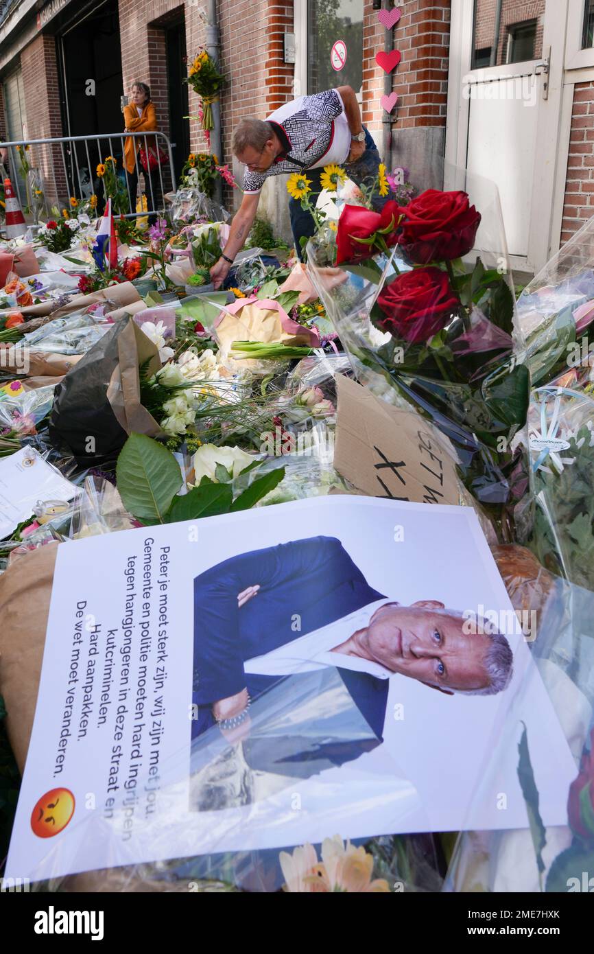 HIs picture and flowers mark the spot where journalist Peter R. de ...