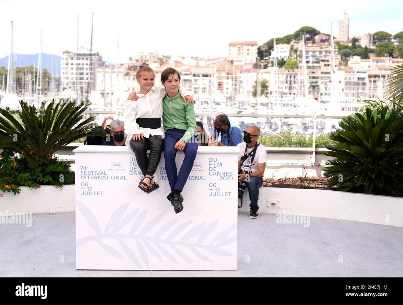 Maya Vanderbeque, left, and Gunter Duret pose for photographers at the ...