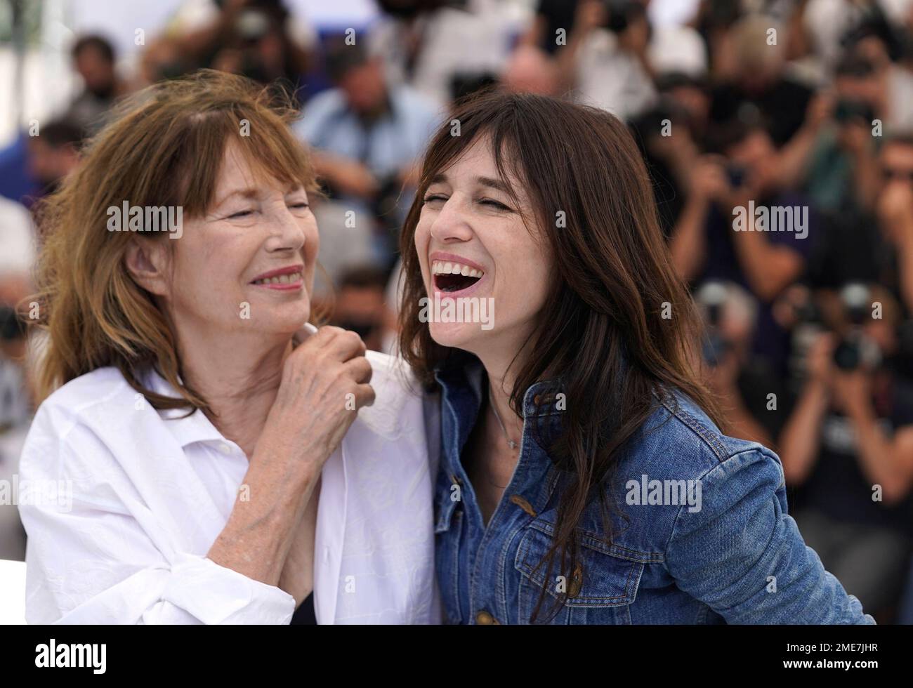Jane Birkin Left And Charlotte Gainsbourg Pose For Photographers At