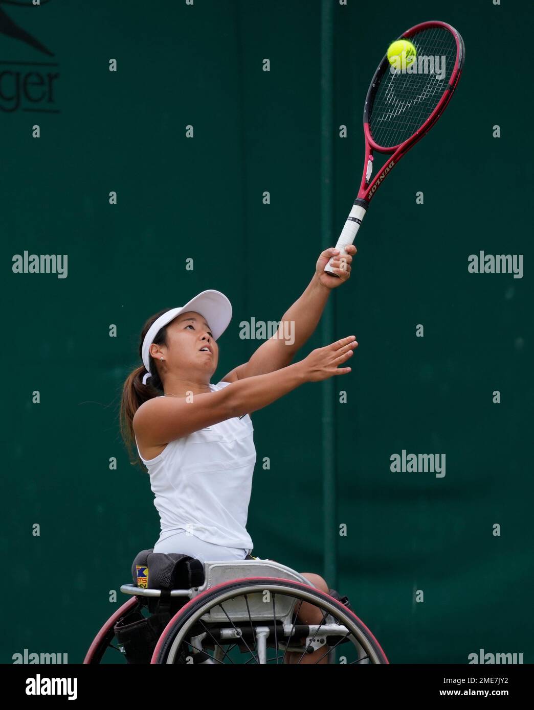 Japan's Yui Kamiji plays a return to compatriot Momoko Ohtani during ...