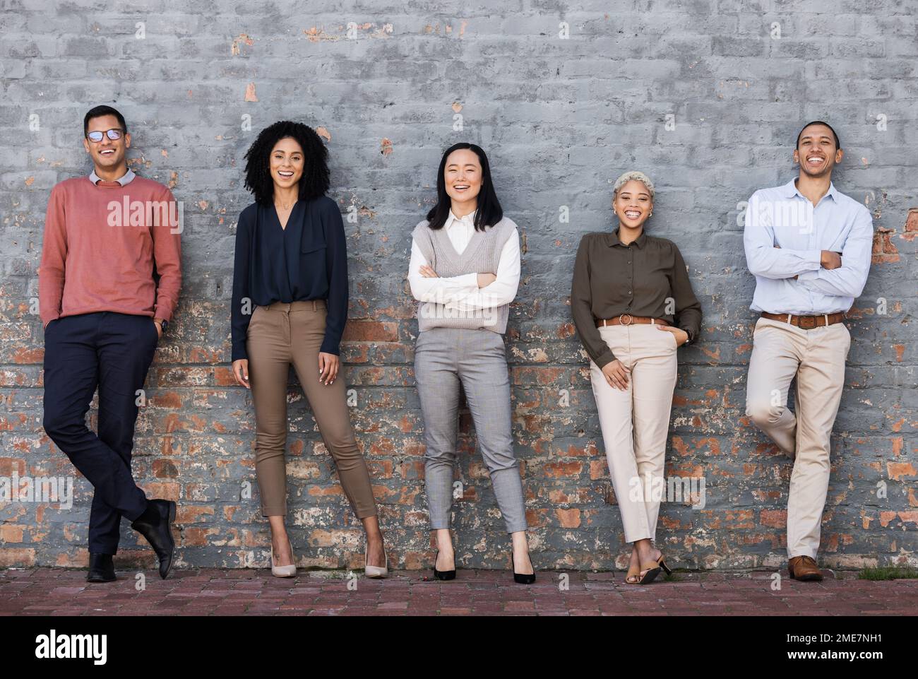 Portrait, collaboration and goals with a business team standing ...