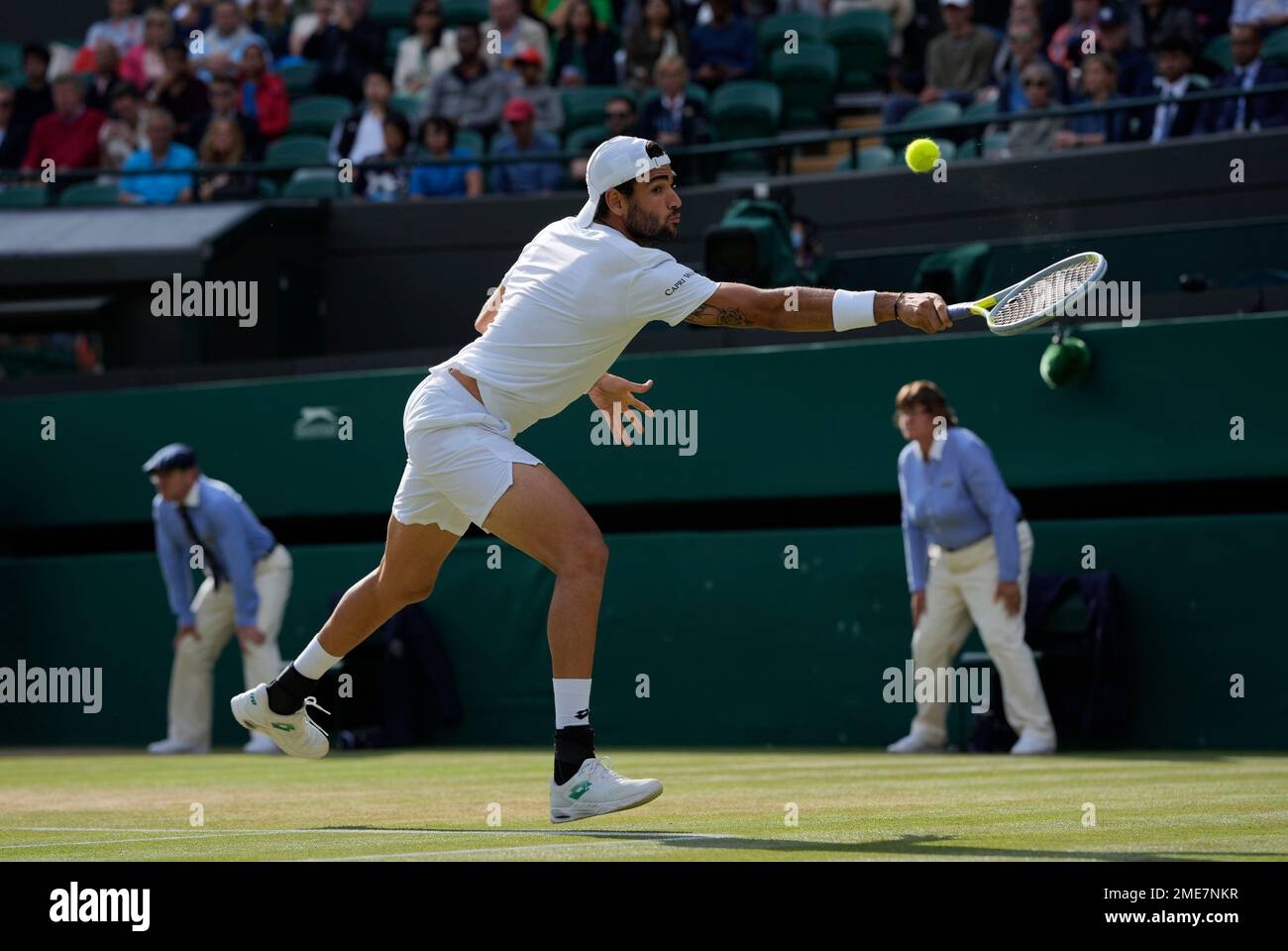 Italy's Matteo Berrettini plays a return to Canada's Felix Auger-Aliassime during the men's ...