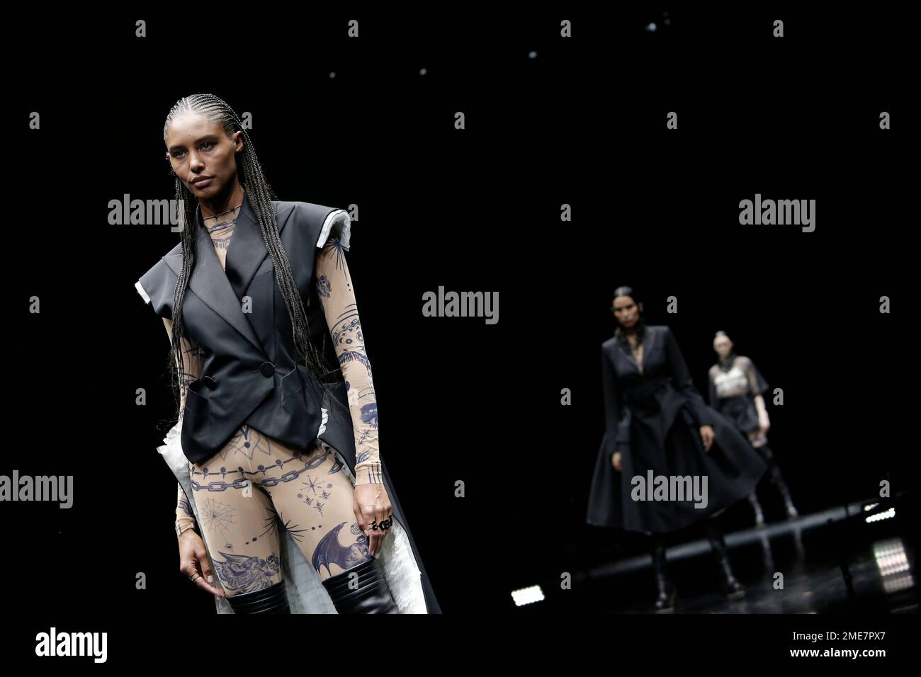 A model wears a creation for Jean Paul Gaultier's Haute Couture Fall ...