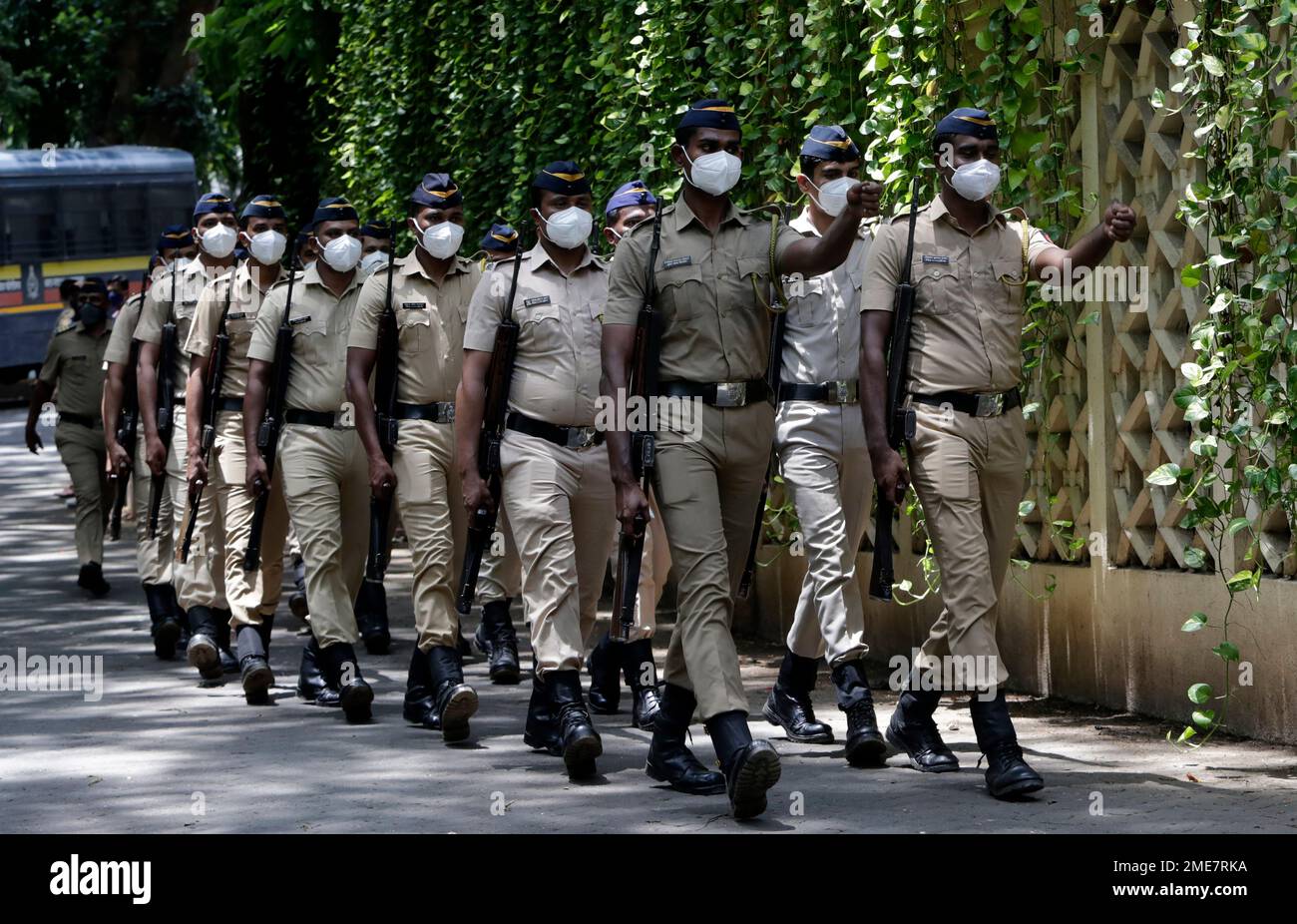 A police contingent arrives at the residence of Bollywood icon Dilip ...