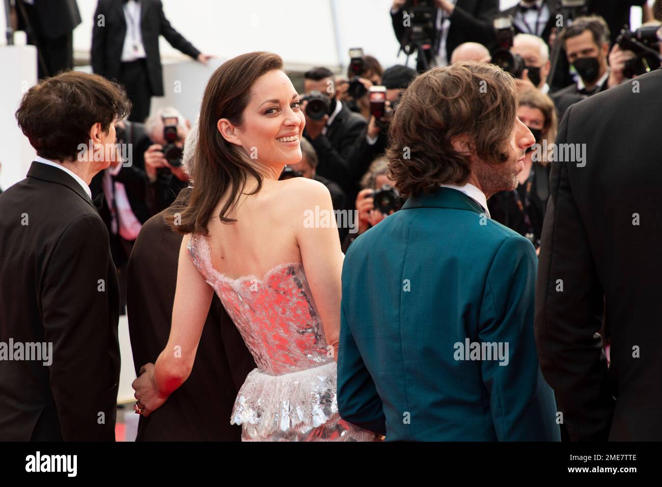Marion Cotillard poses for photographers upon arrival at the premiere ...