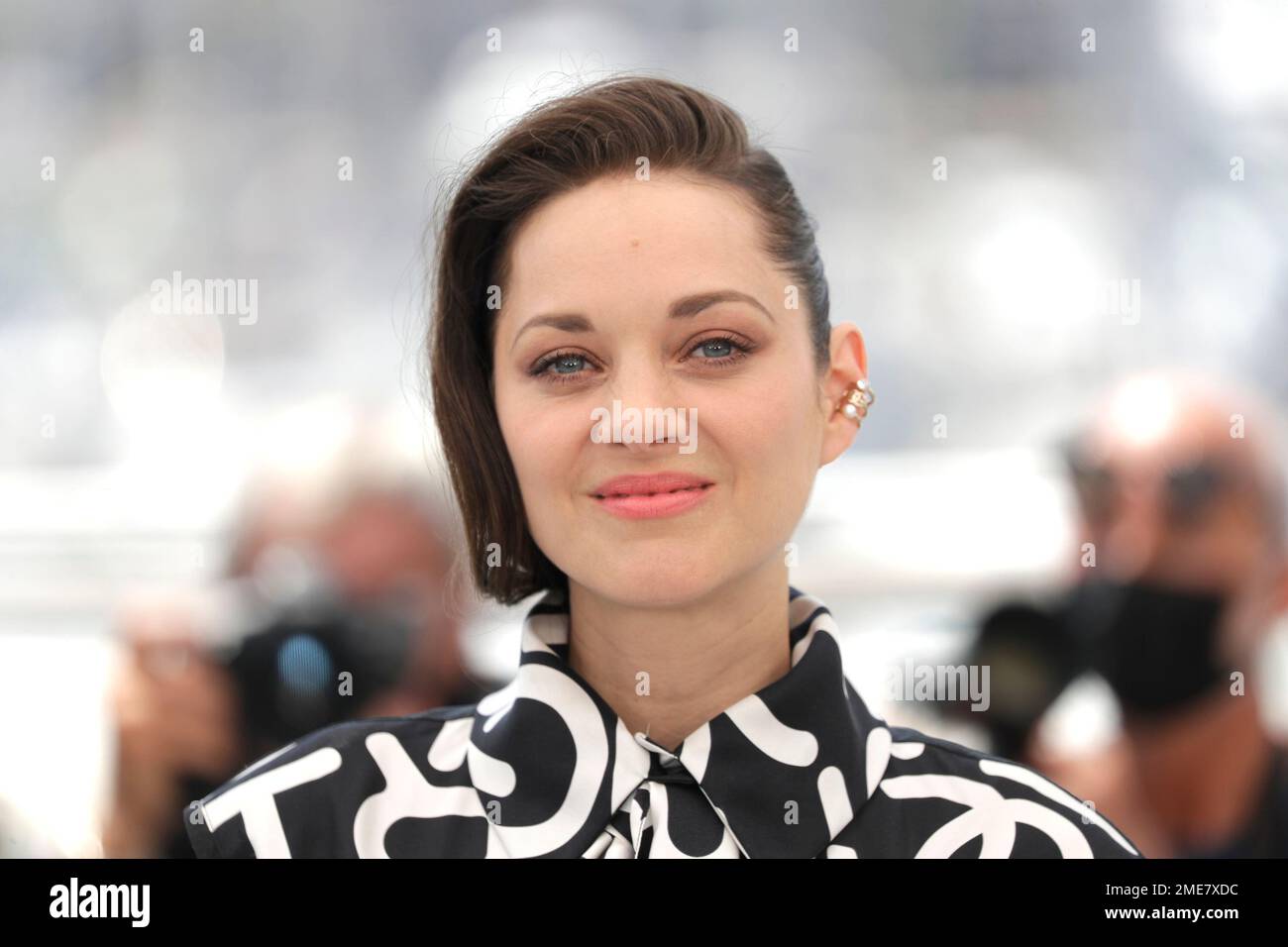 Marion Cotillard poses for photographers at the photo call for the film ...