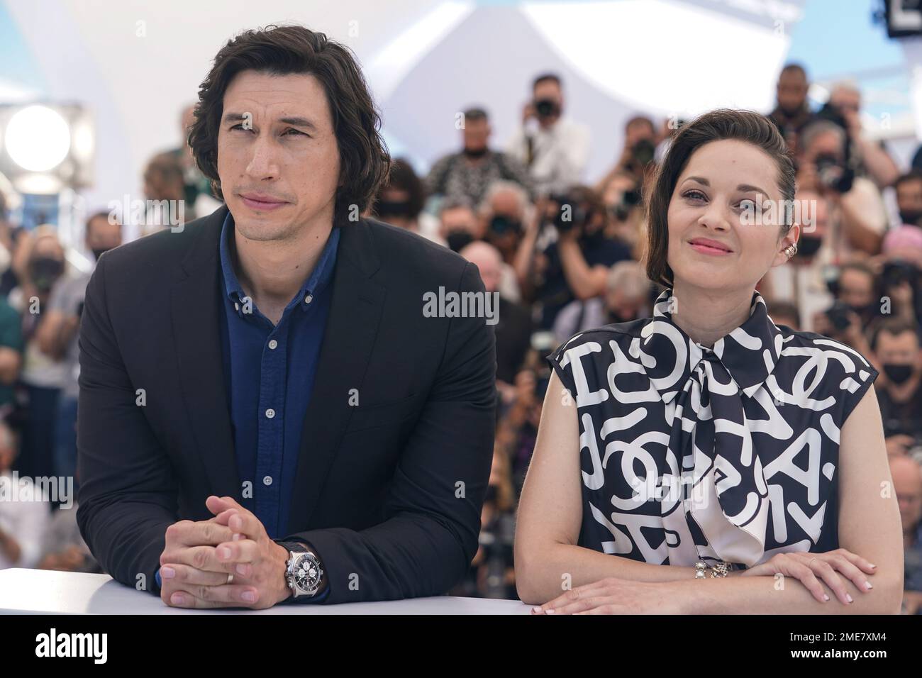 Adam Driver, left, and Marion Cotillard pose for photographers at the ...