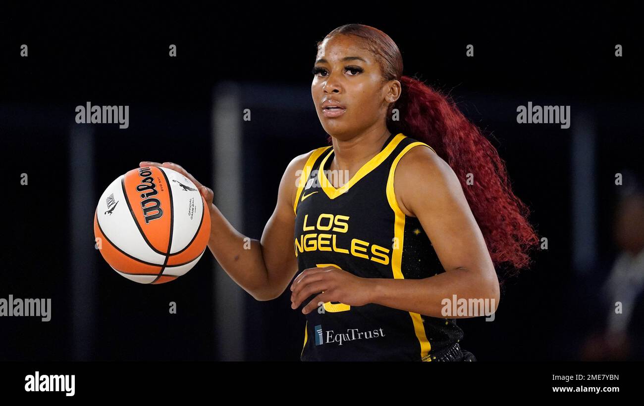 Los Angeles Sparks guard Te'a Cooper dribbles during the first half of ...