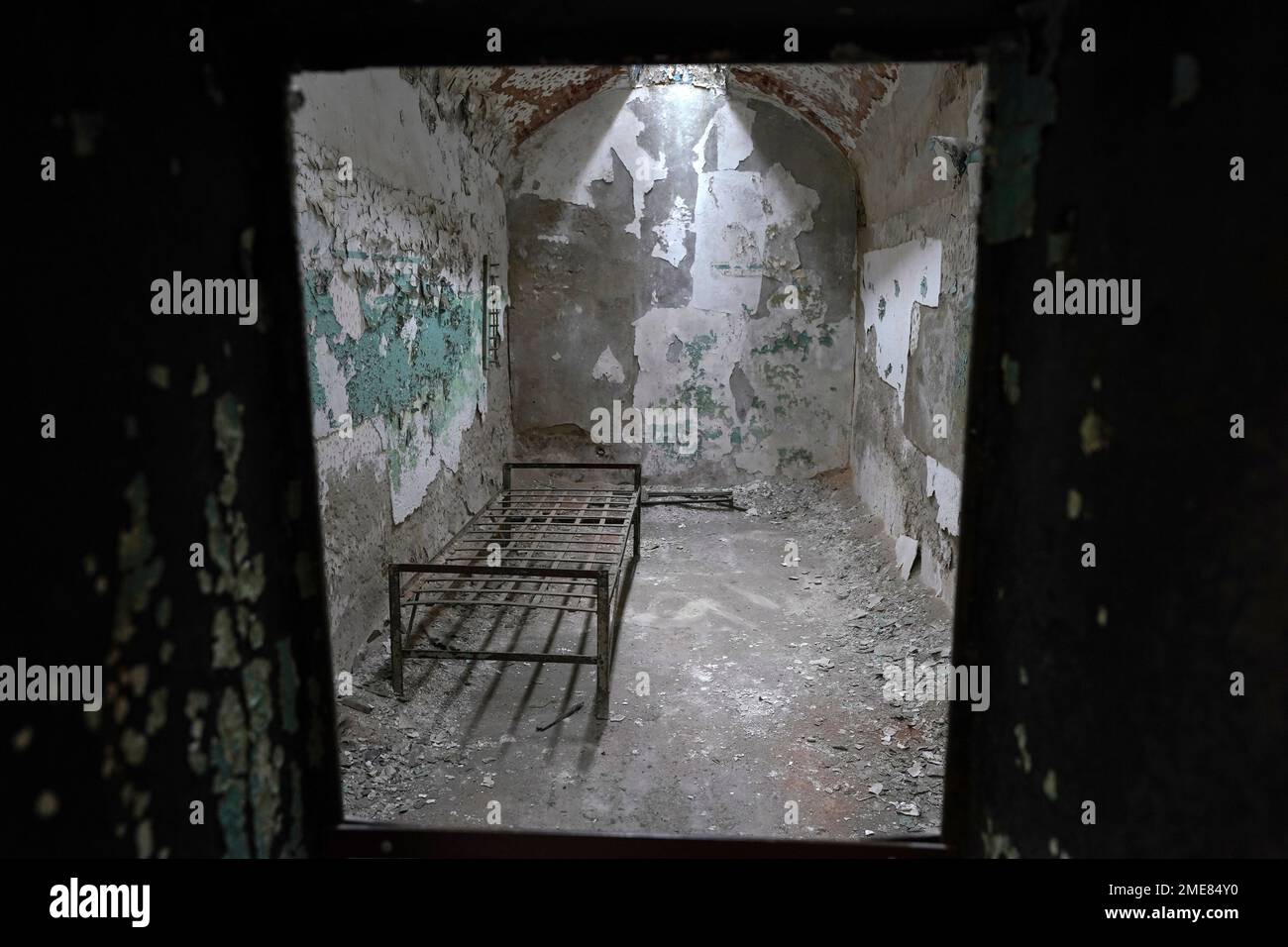 A prison cell and bed at Eastern State Penitentiary is seen on Saturday ...