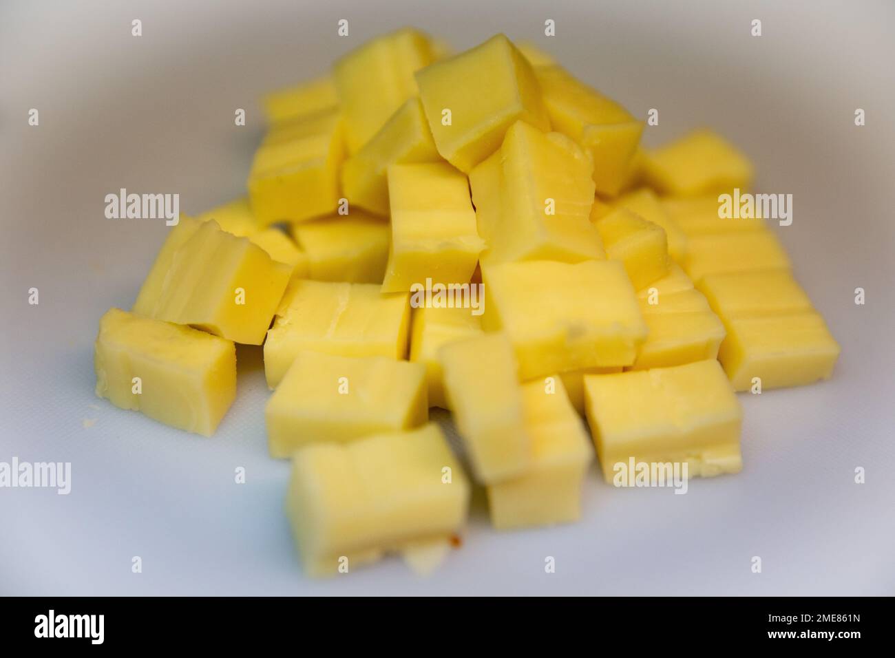 cut up mozerella for appetizer Stock Photo - Alamy