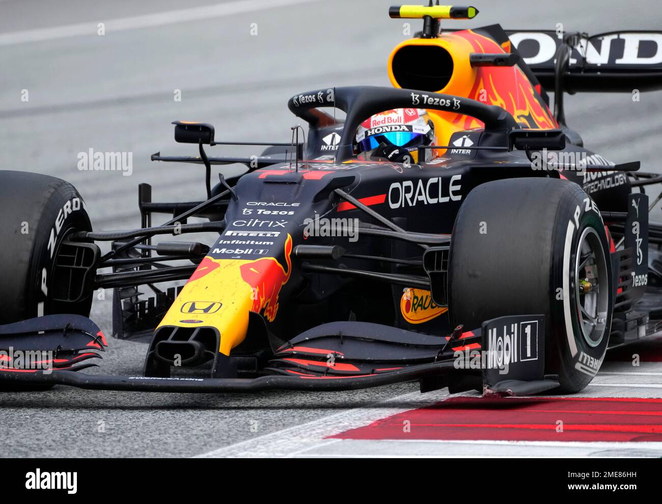 Red Bull driver Sergio Perez of Mexico steers his car during the Austrian Formula One Grand Prix ...