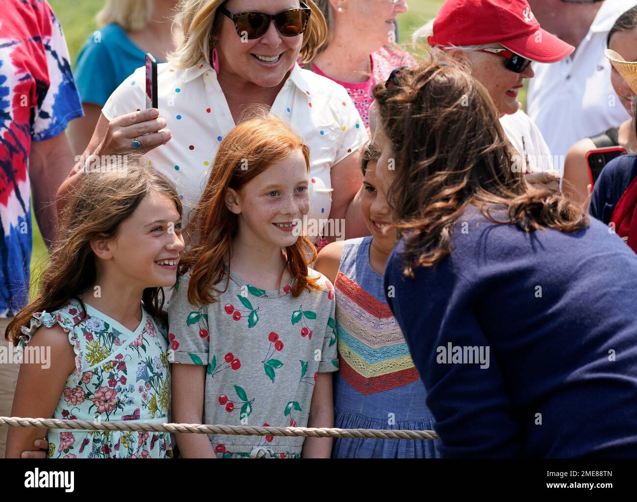 Michigan Governor Gretchen Whitmer talks with people after touring King ...