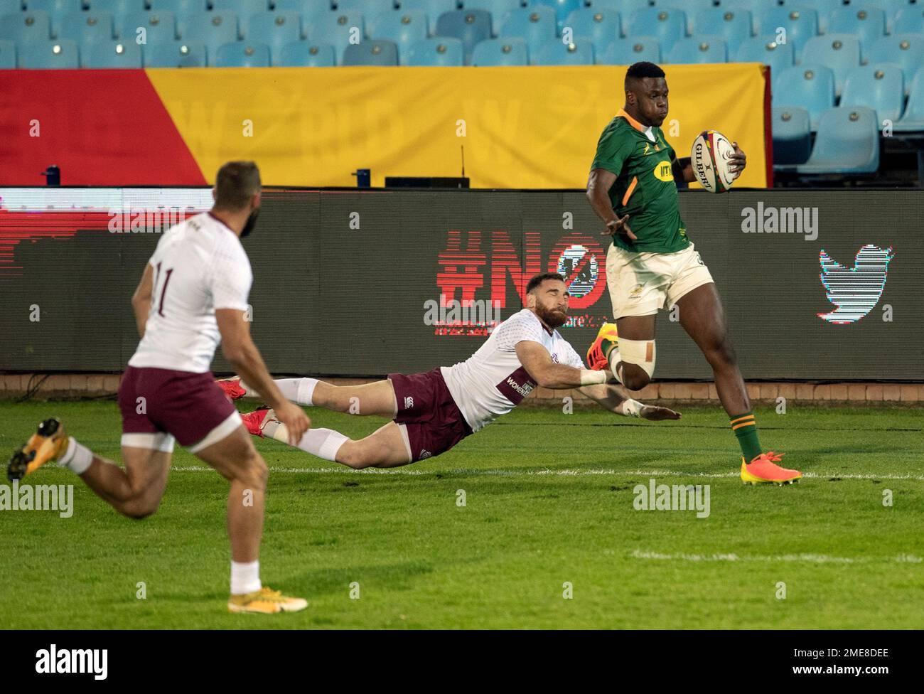 South Africa's Aphelele Fassi, right, avoids a tackles from Georgia's ...