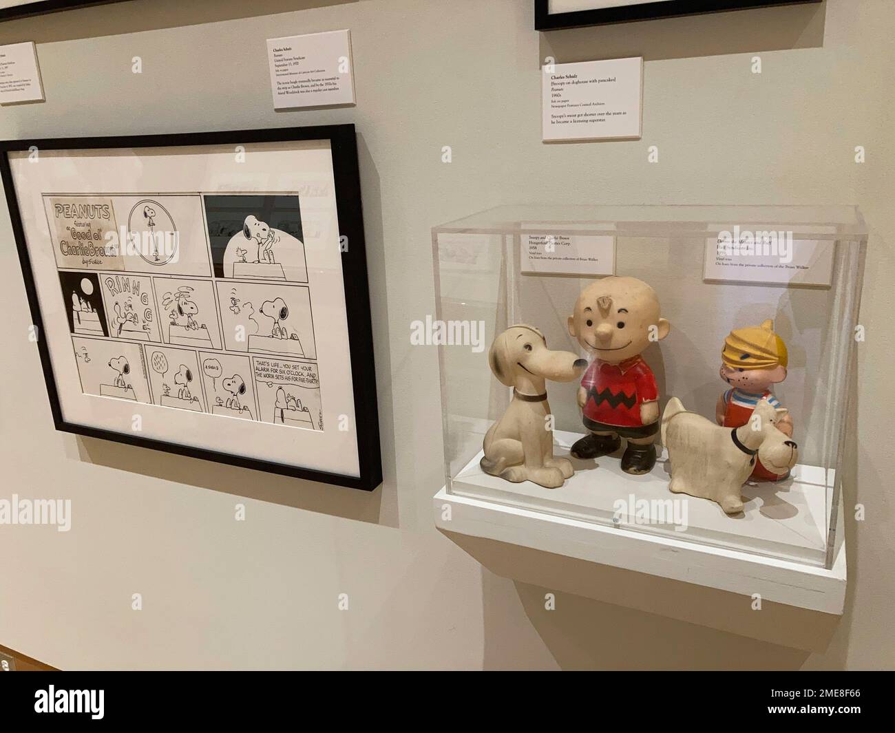 A new exhibit on dogs in cartoons and comic strips includes vinyl toys ...