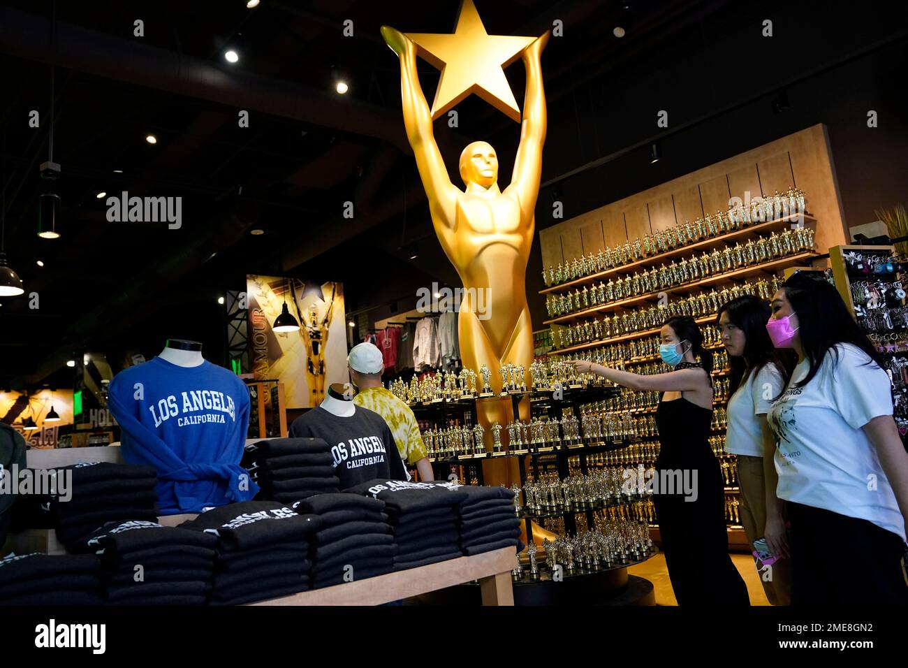 Visitors walk through a gift shop Thursday, July 1, 2021, in the ...