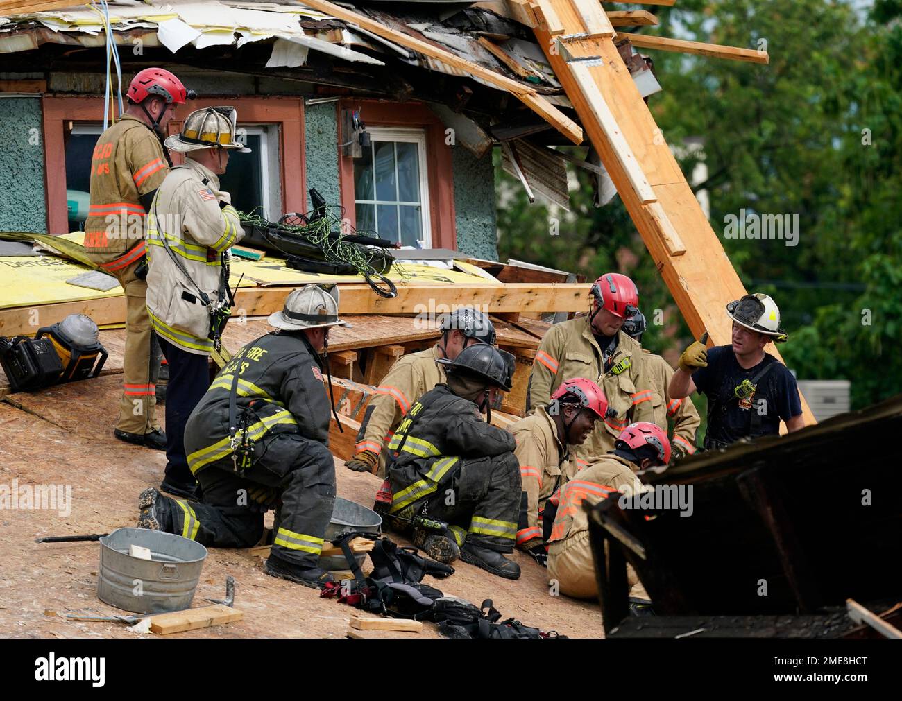 Emergency crews respond after a building under construction collapsed ...