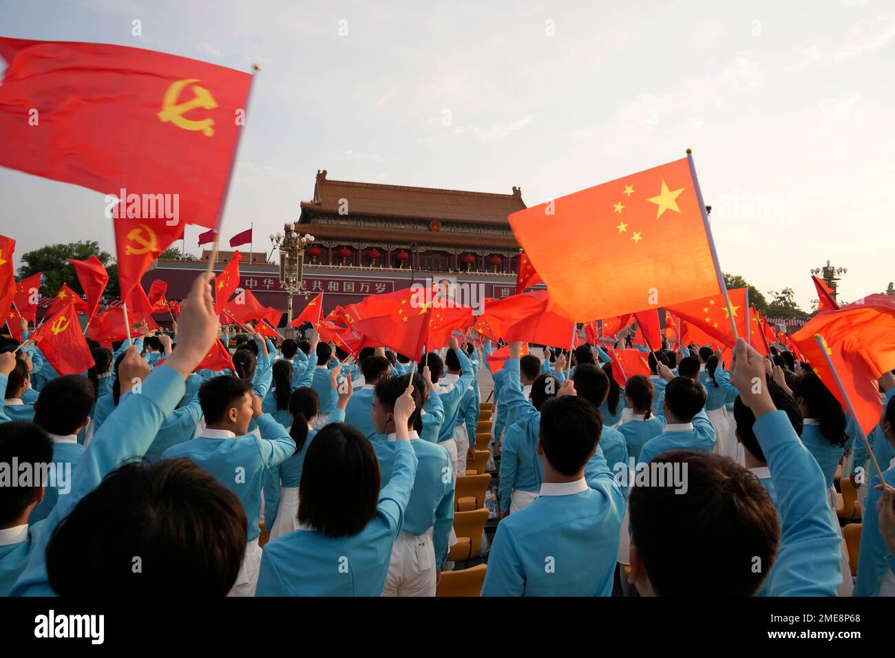 Chinese flags are waved during a rehearsal for a ceremony to mark the ...