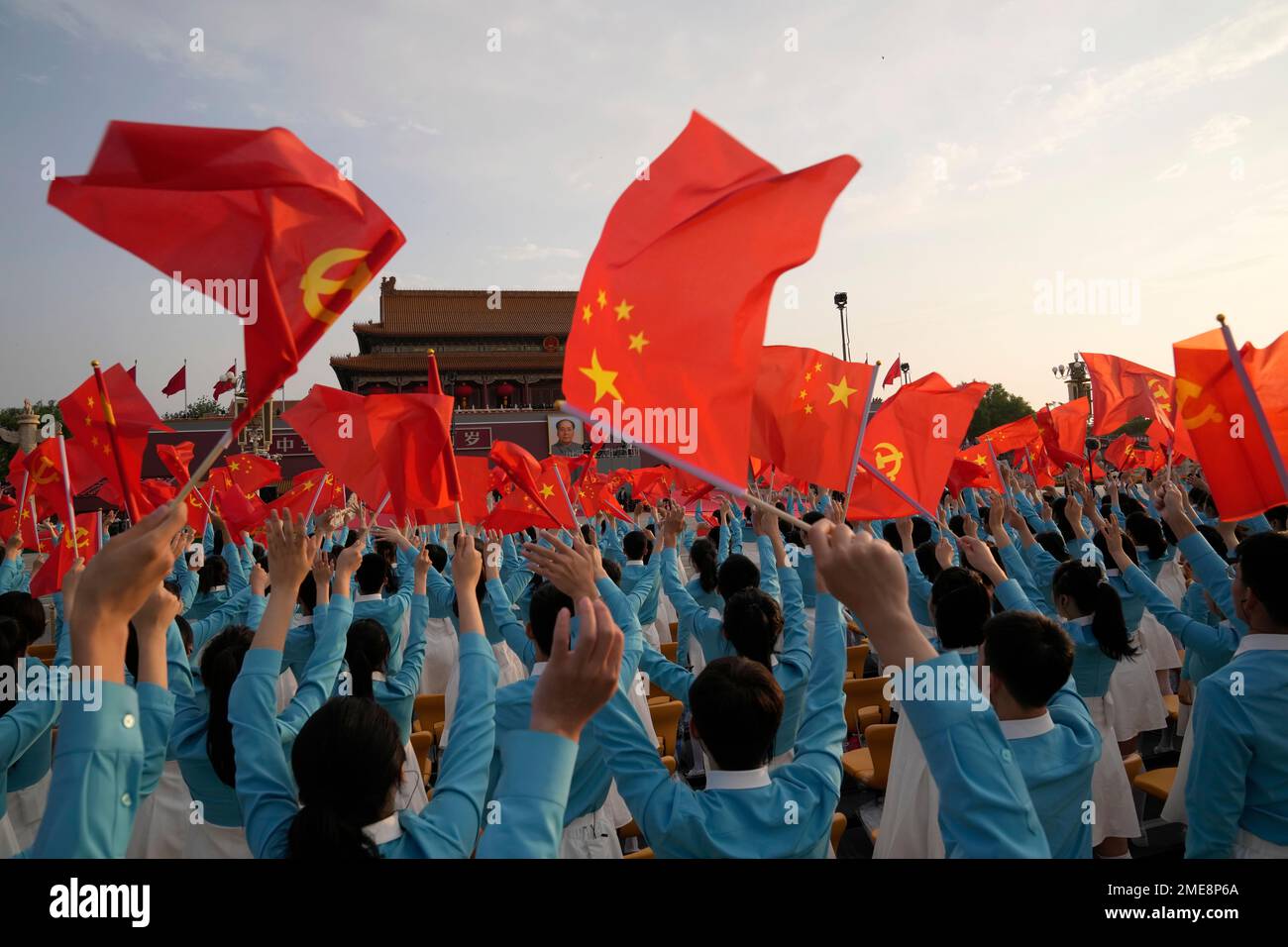 Chinese flags are waved during a rehearsal for a ceremony to mark the ...
