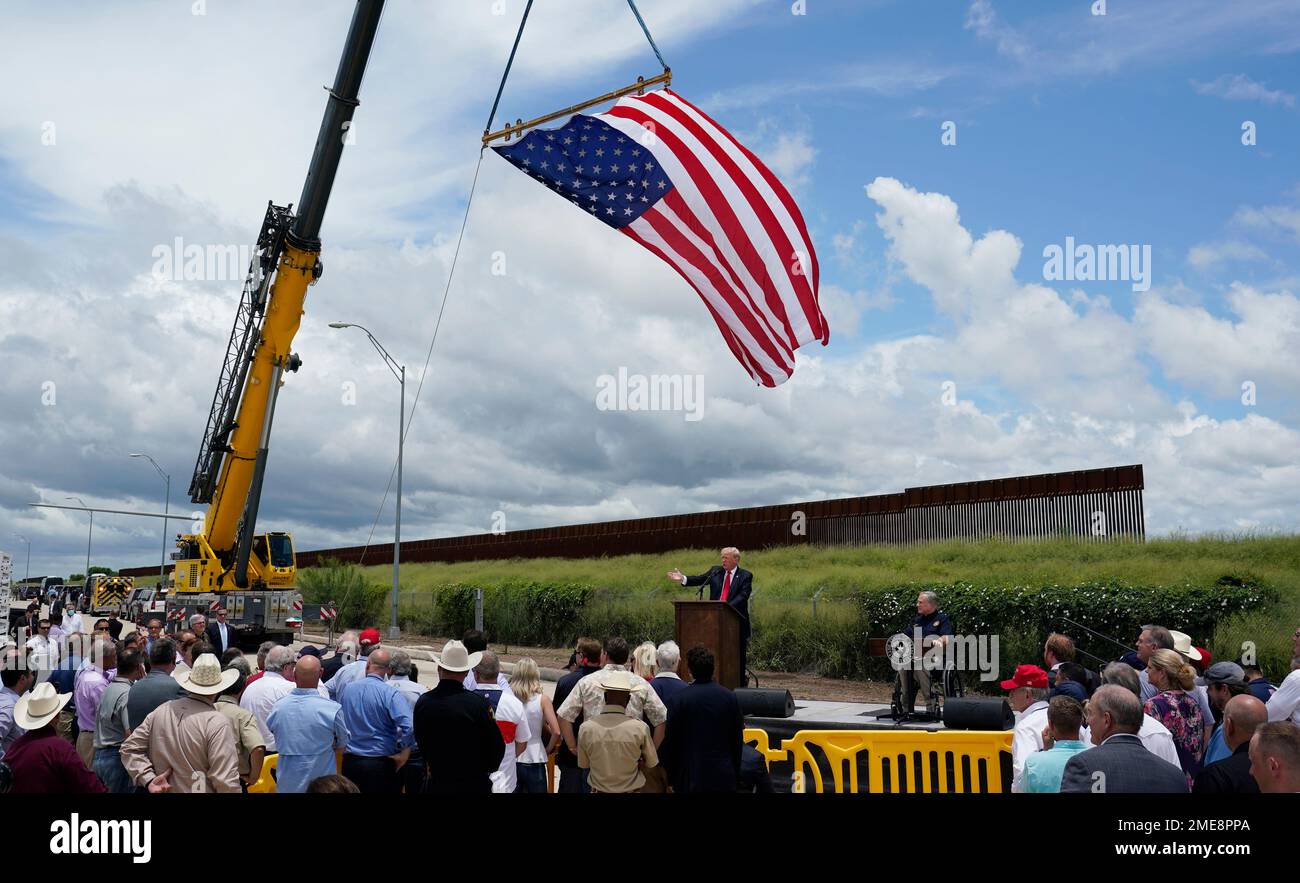 Former President Donald Trump, left, and Texas Gov. Greg Abbott, right ...