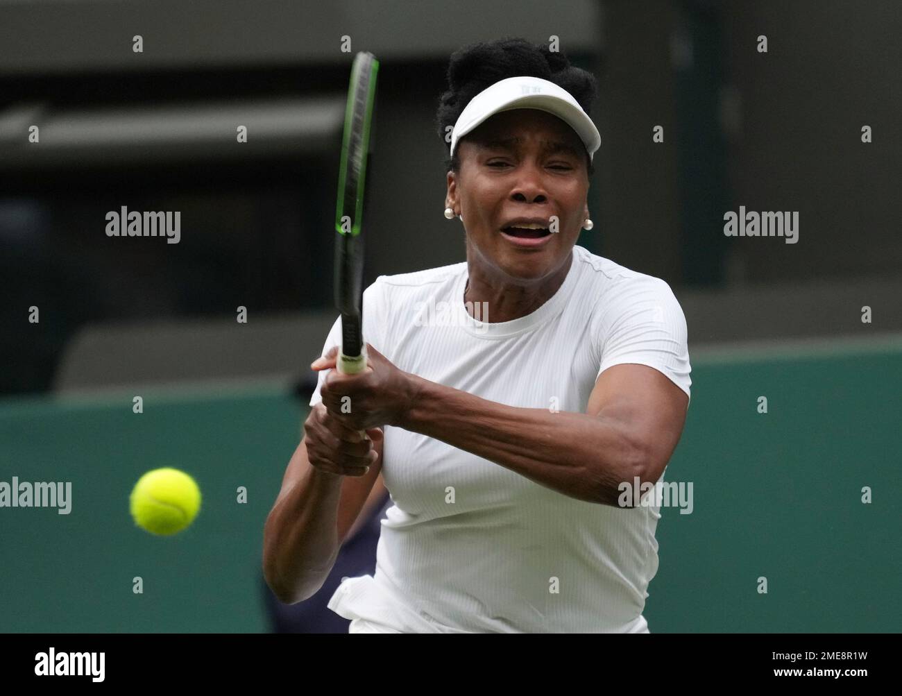 Venus Williams of the US plays a return to Tunisia's Ons Jabeur during ...