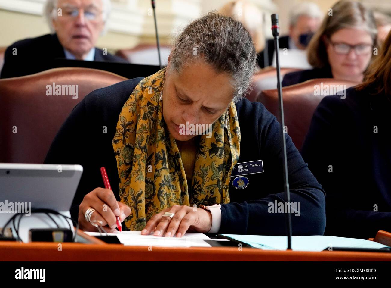Rep. Rachel Ross-Talbot, D-Portland, works at her desk during the final ...