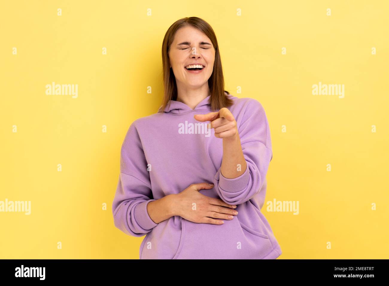 Girl Laughing Hysterically And Pointing
