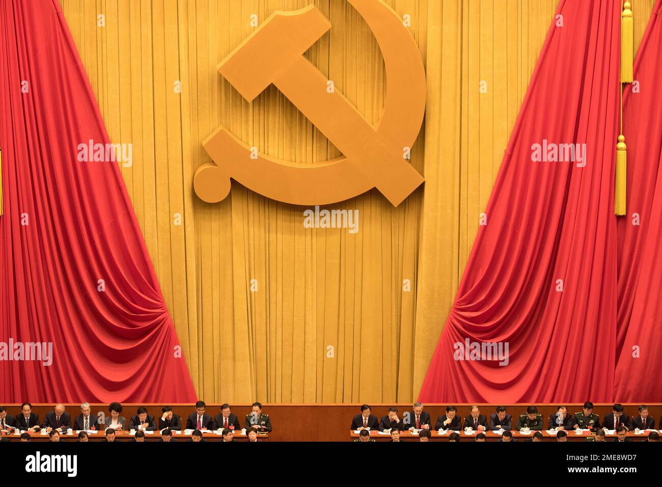 In this Oct. 18, 2017, file photo, Chinese communists party cadres ...