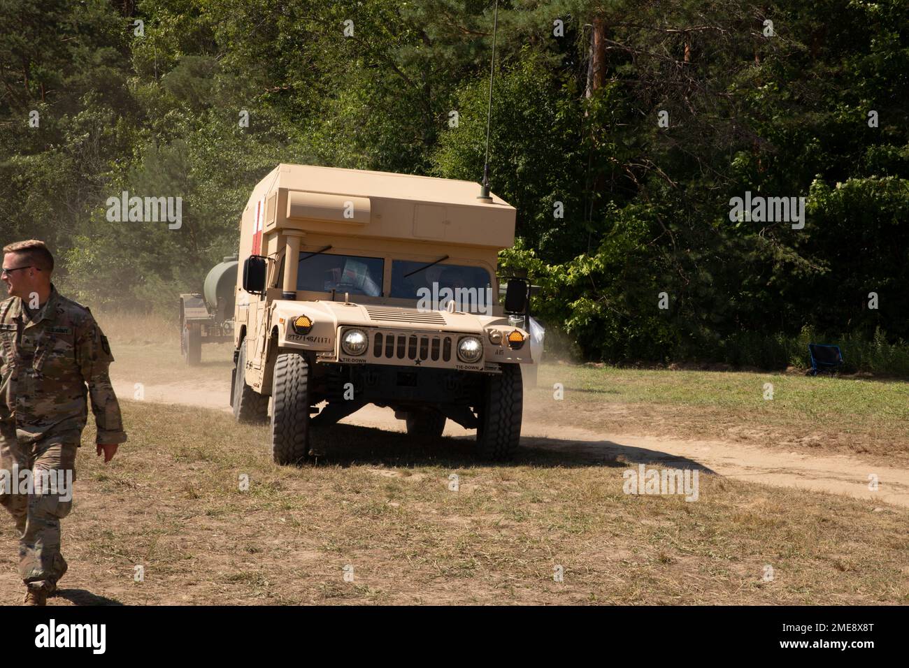 A Humvee 2-CT Ambulance drives into the training area of the 146th ...