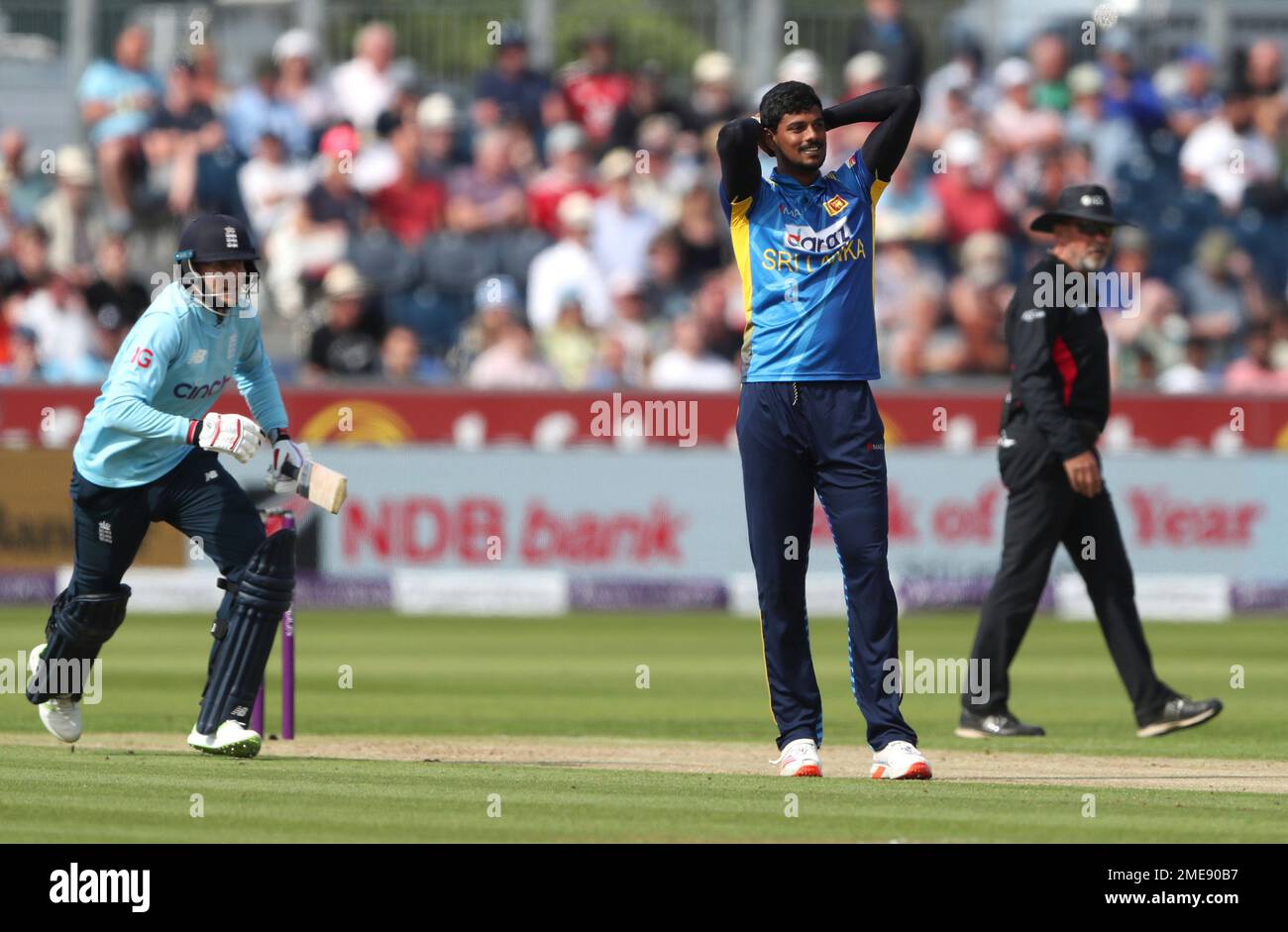 Sri Lanka's Binuru Fernando, center, reacts after bowling a delivery ...