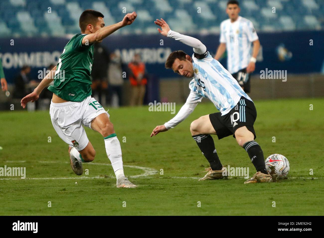 Bolivia's Boris Cespedes, left, and Argentina's Lionel Messi battle for ...
