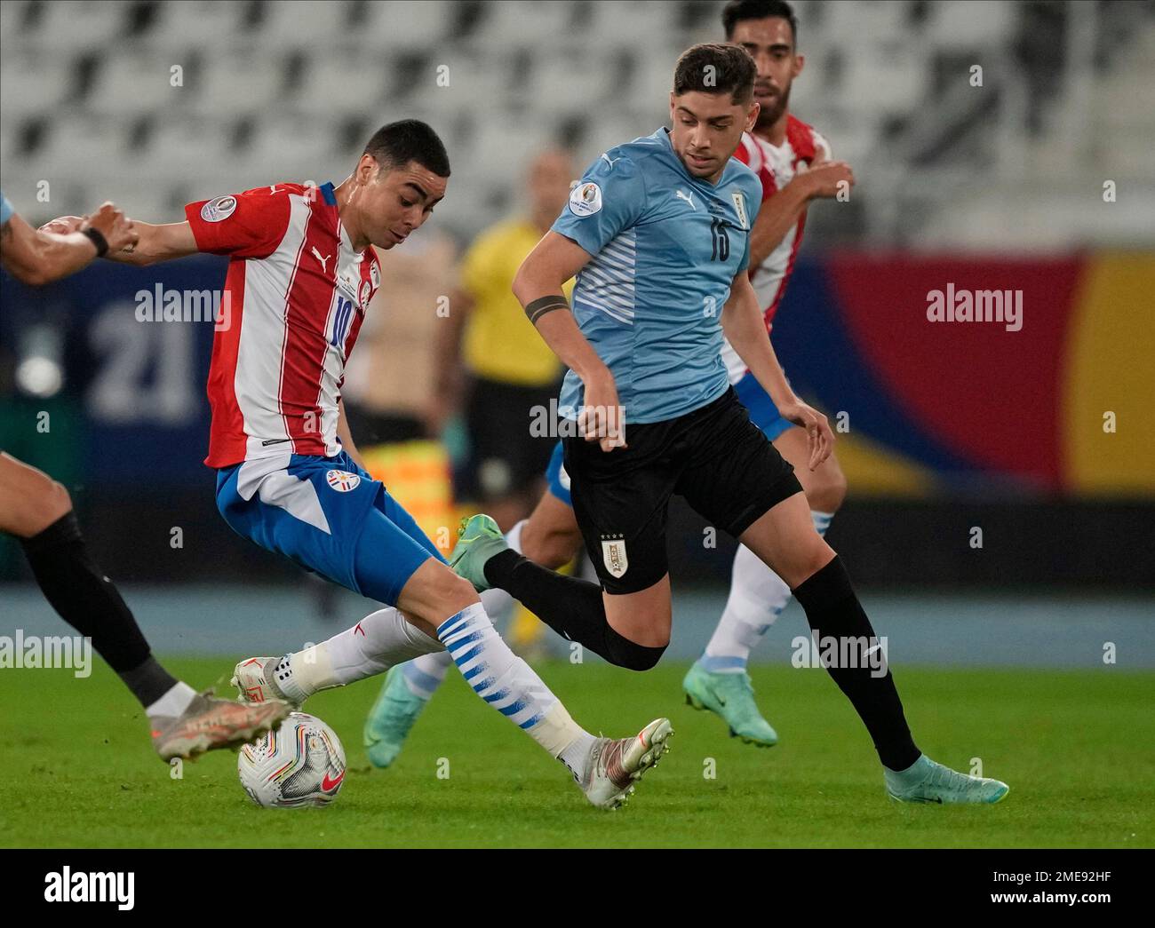 Paraguay's Miguel Almiron, left, and Uruguay's Federico Valverde fight ...