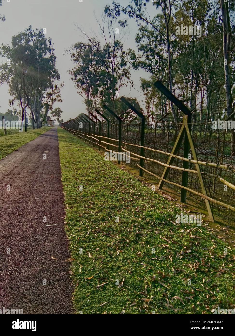 09.08.2021 raiganj west bengal india, border gate and fence between ...