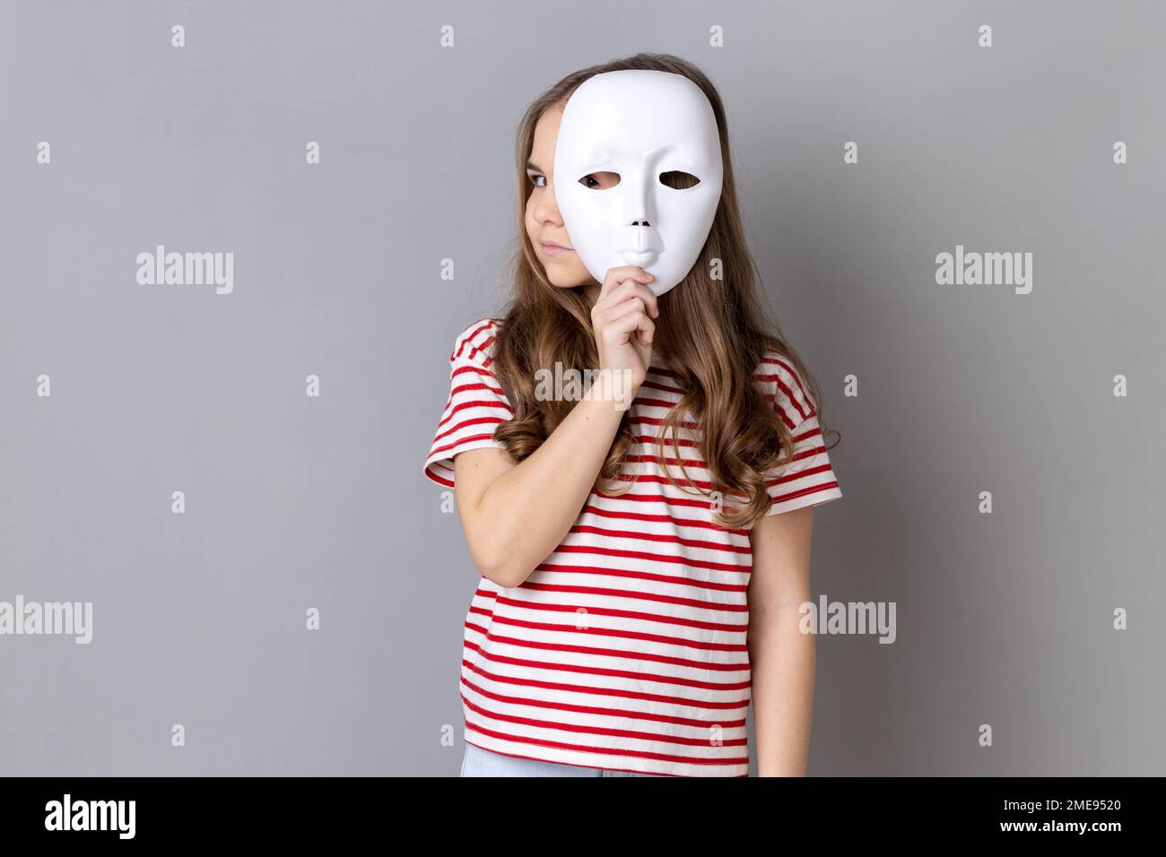 Girl Hiding Face With Mask