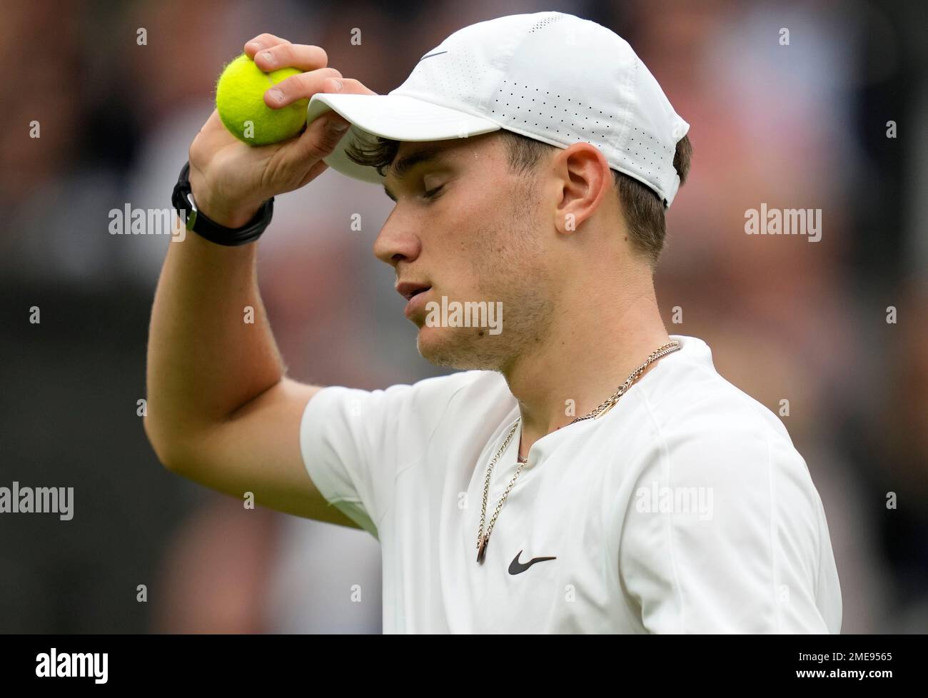 Britain's Jack Draper reacts after losing a point to Serbia's Novak ...