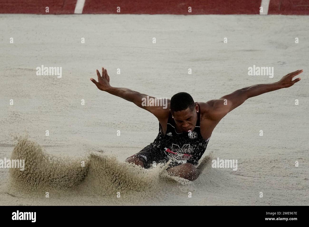 Cameron Crump competes during the finals of the men's long jump at the ...