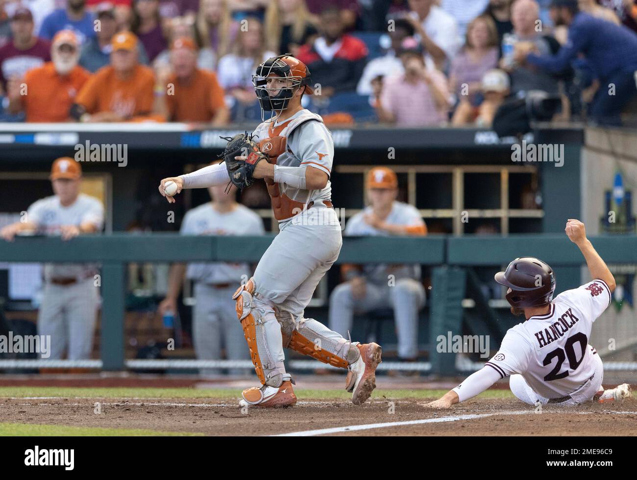 Mississippi State's Luke Hancock (20), right, is forced out at home by ...